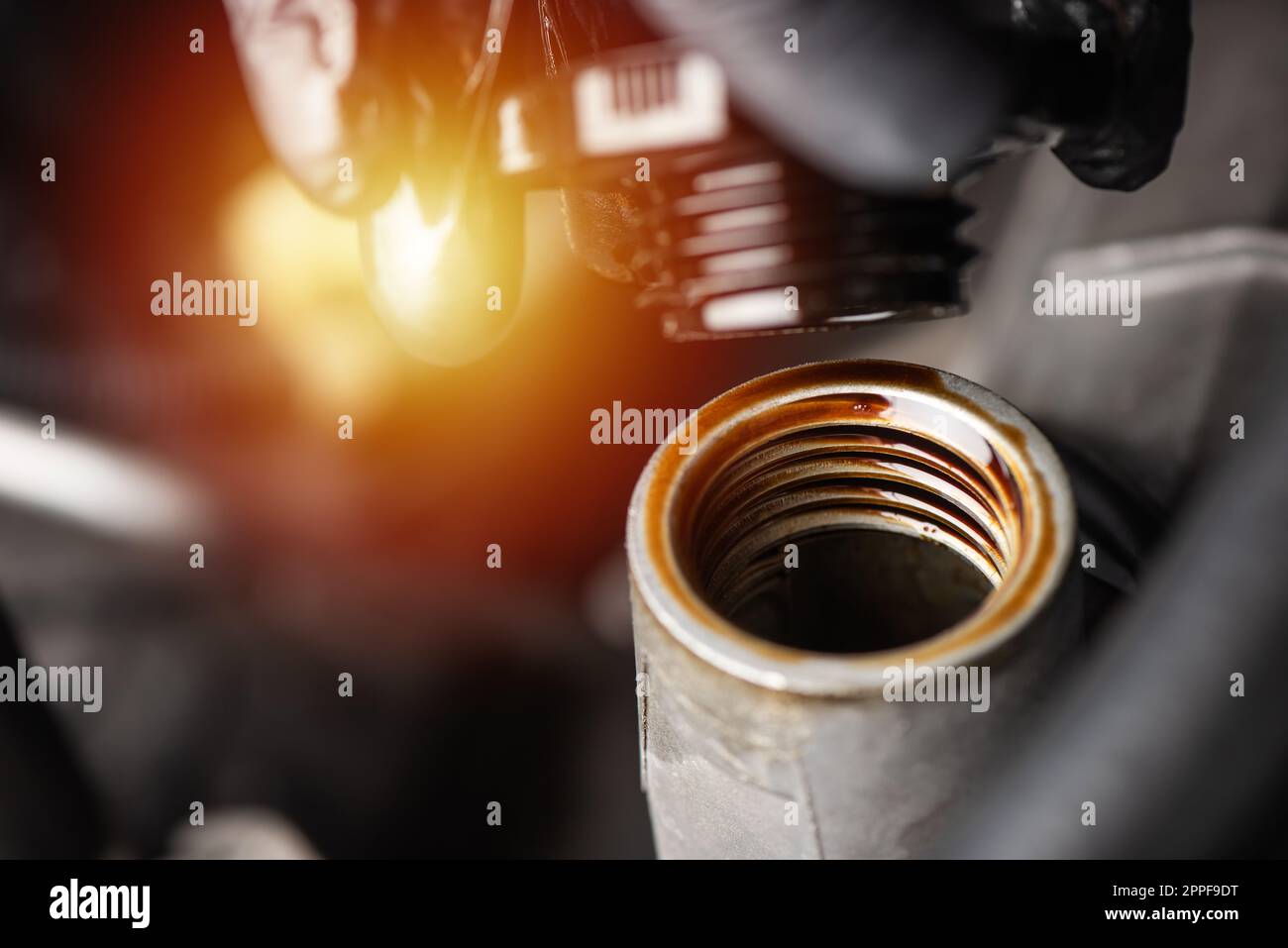 Technician opening the motor oil cap. Car maintenance concept Stock ...