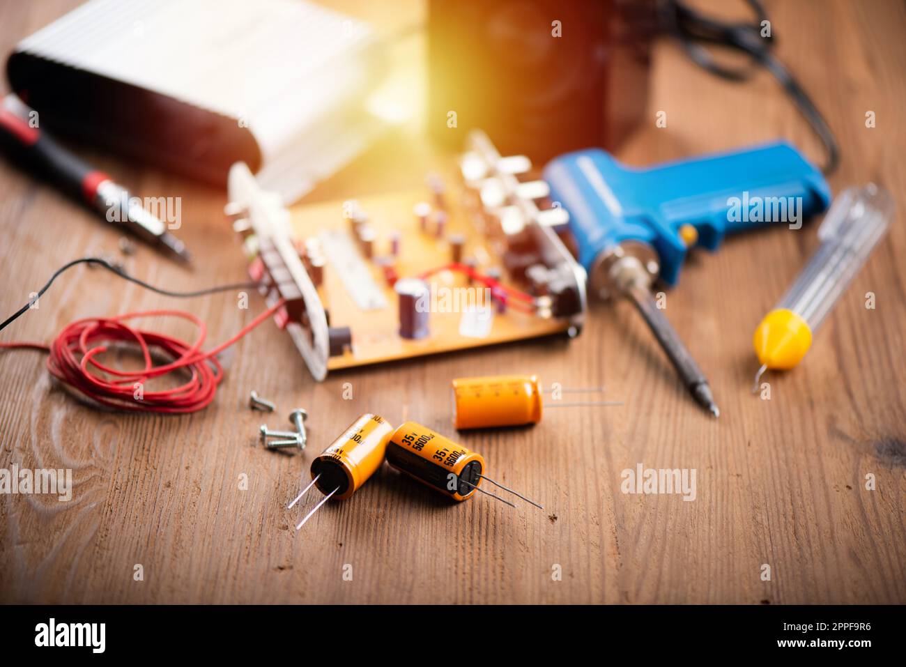 Technician repairing the electronic device. Reparing the audio ...