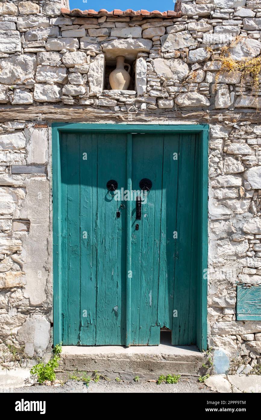 Colourful traditional wooden doors at the entrance to a property in ...