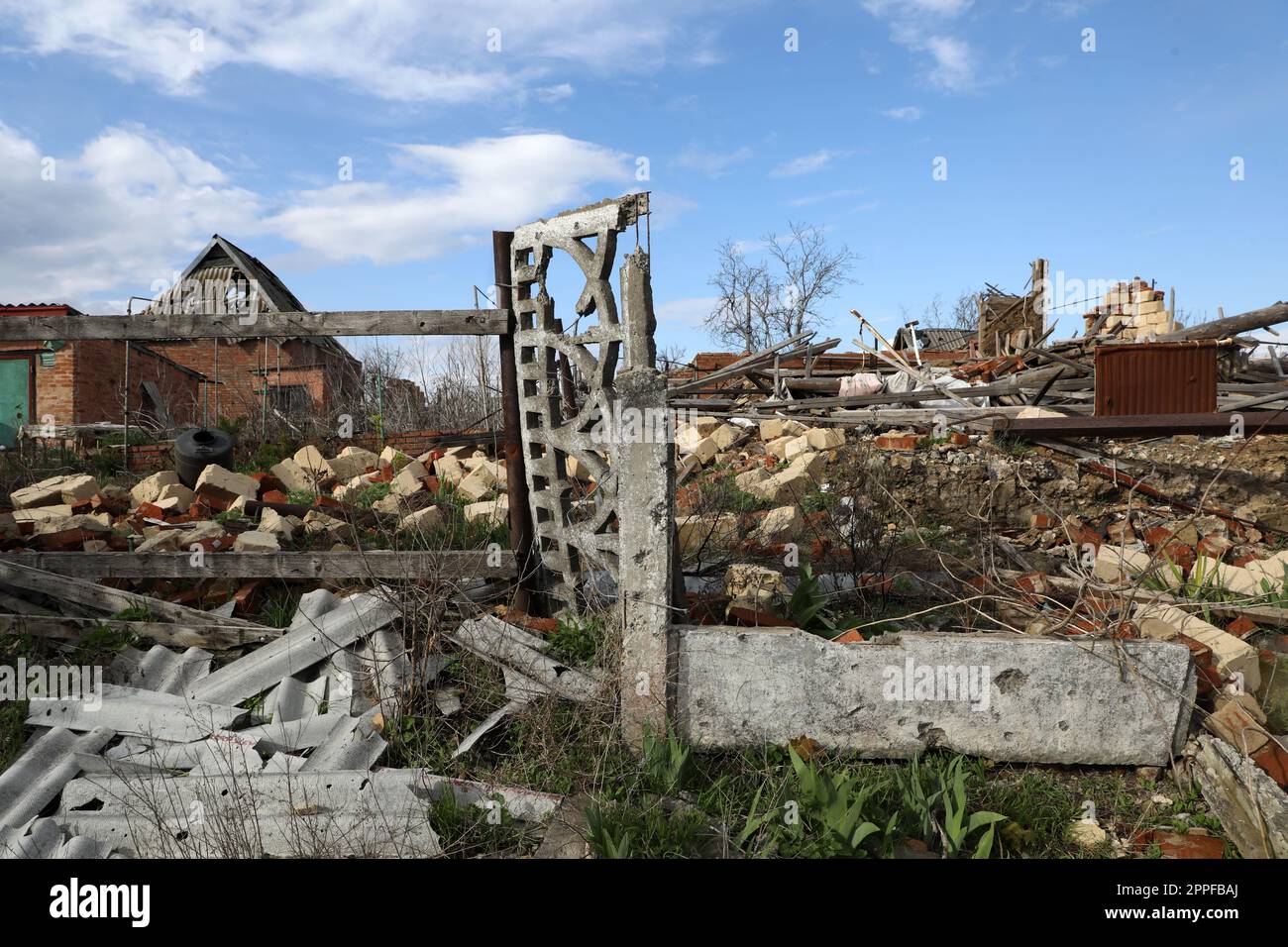 DOLYNA, UKRAINE - APRIL 23, 2023 - A house ruined in the shelling of ...