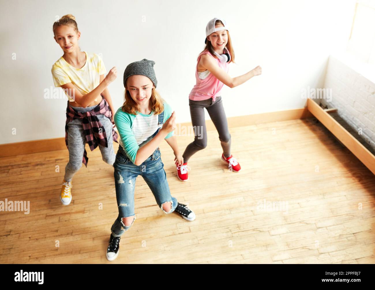 Move to the music, dont lose the rhythm. young girls dancing in a dance ...