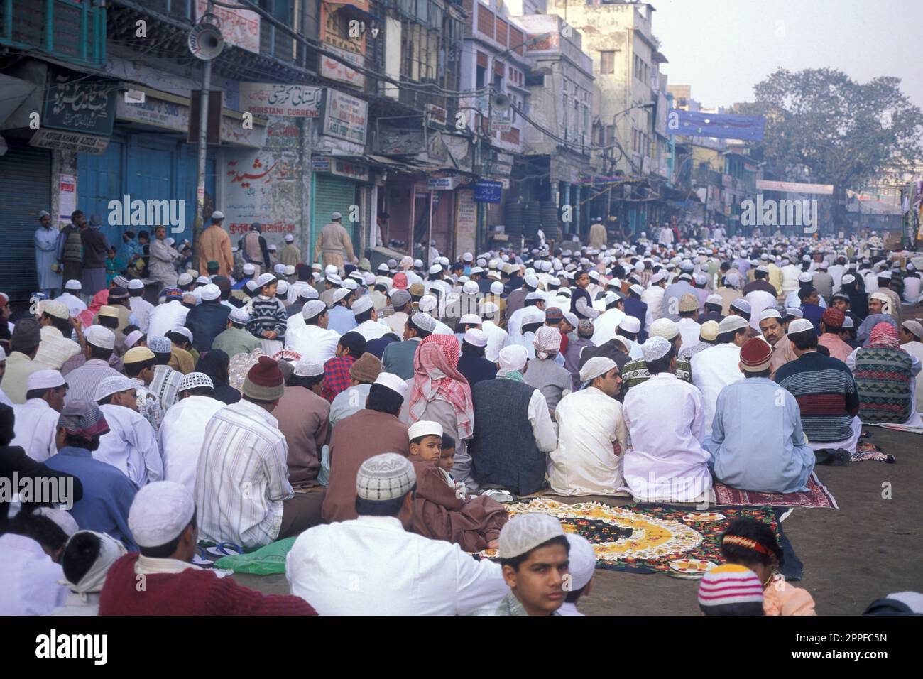 Muslim People pray at the Break Ramadan Fest in front of the Jama Masjid Mosque in Old Delhi in ...