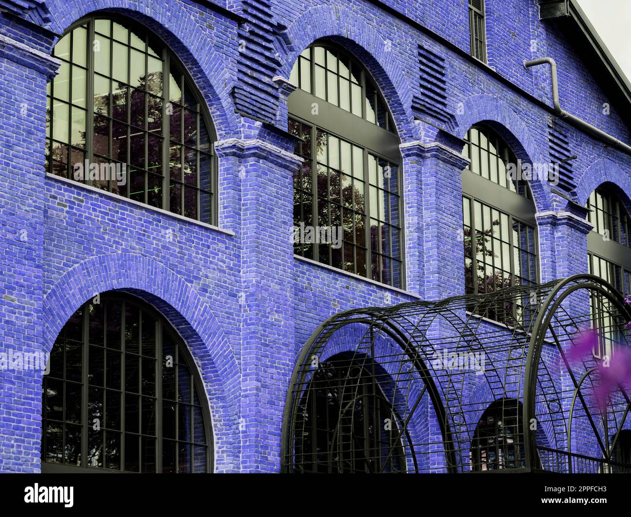 facade of a brick building. loft style. blue old building exterior ...