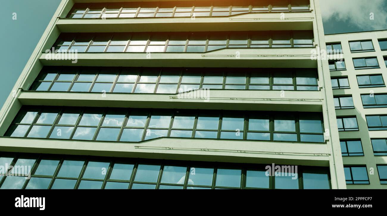 Modern glass apartment building. Facades on a bright sunny day Stock ...
