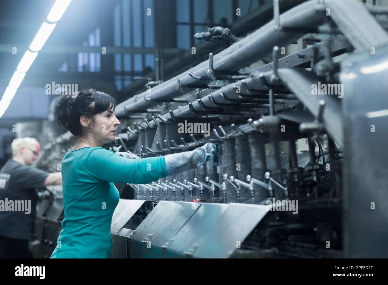 Two women working in the steel wool cleaner industry, Lahr, Baden ...