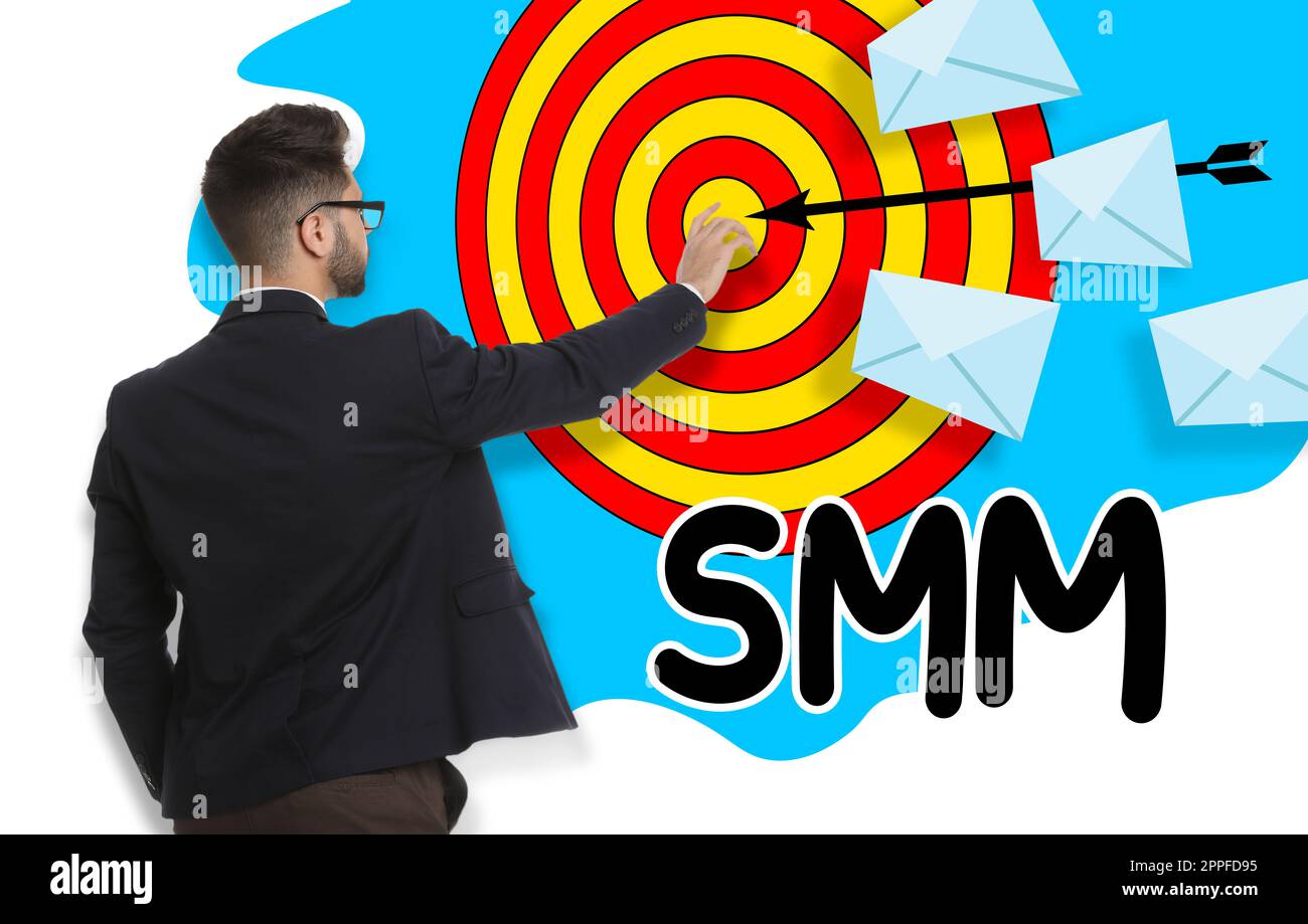 Social media marketing. Man in business attire, abbreviation SMM, dart ...
