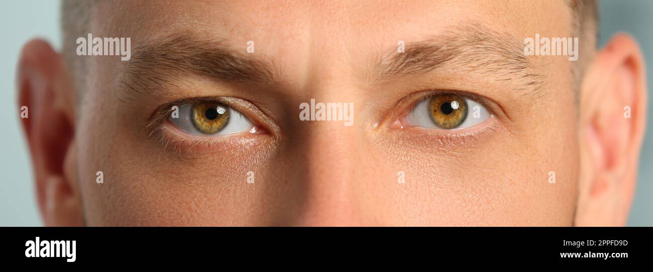 Closeup view of man with beautiful eyes. Banner design Stock Photo - Alamy