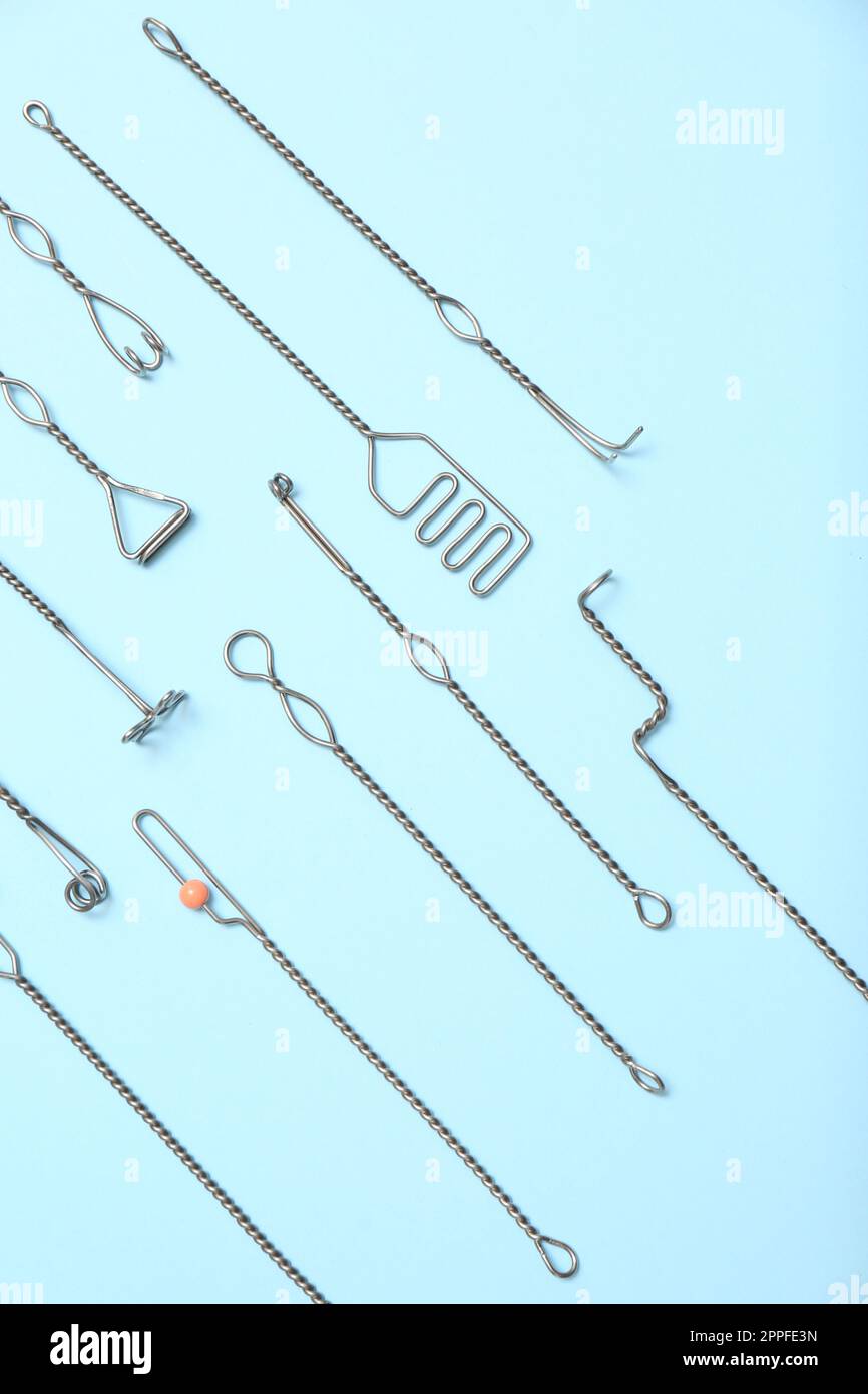 Set of logopedic probes for speech therapy on light blue background ...