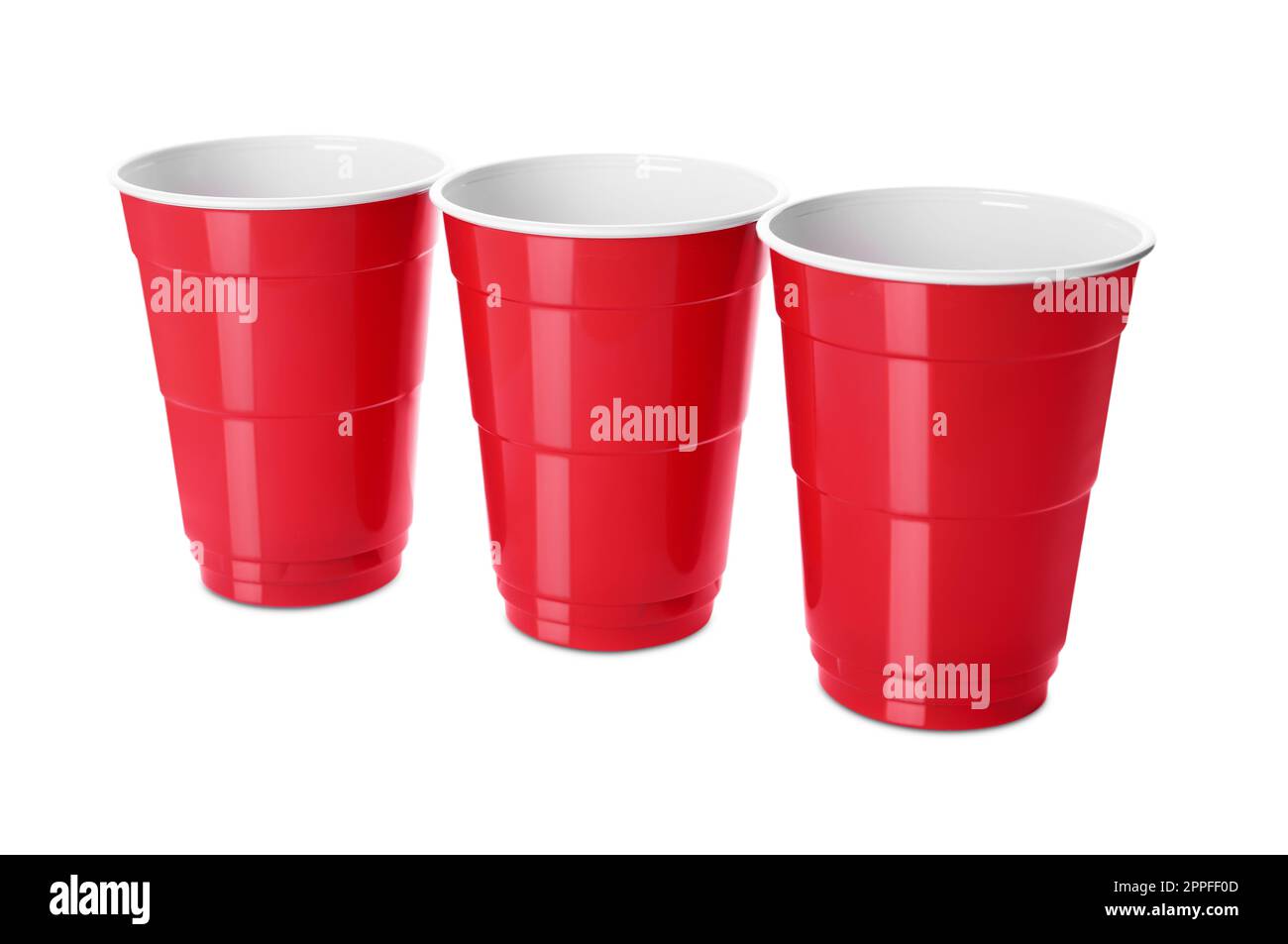 Red plastic cups on white background. Beer pong game Stock Photo - Alamy