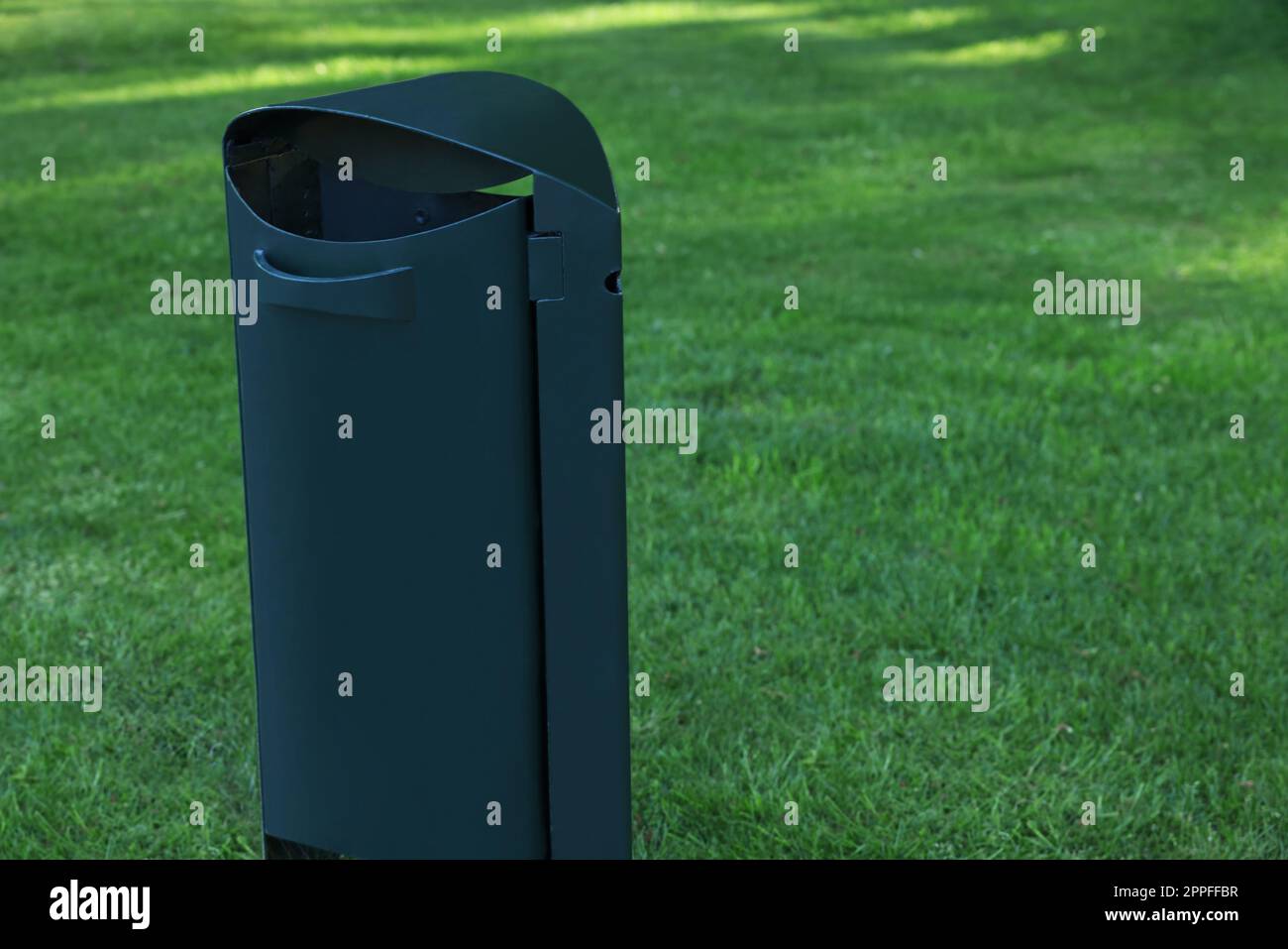 Recycling trash bin growing grass hi-res stock photography and images ...