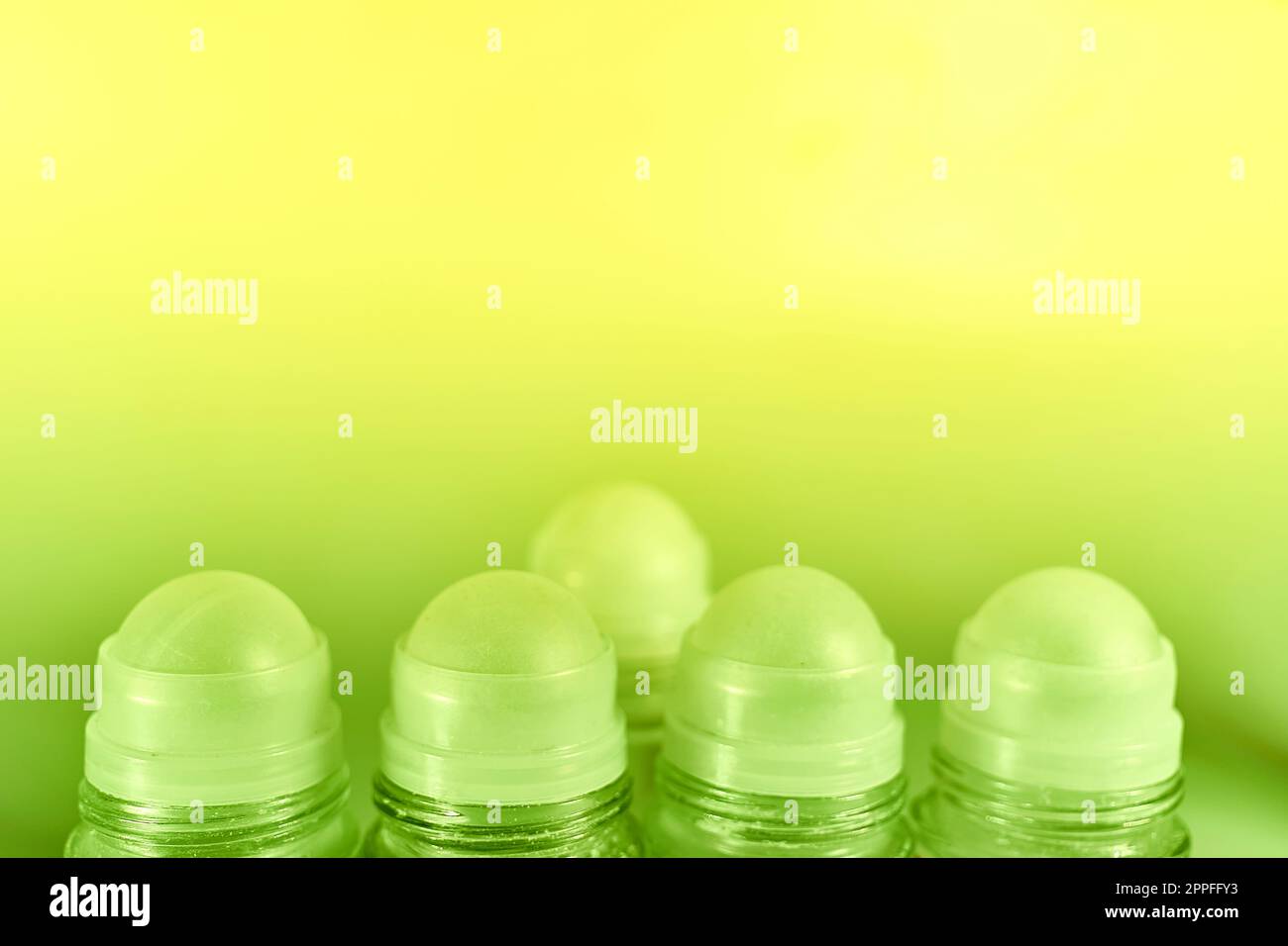 Top of roller ball deodorant glass bottles in green healthy light Stock ...