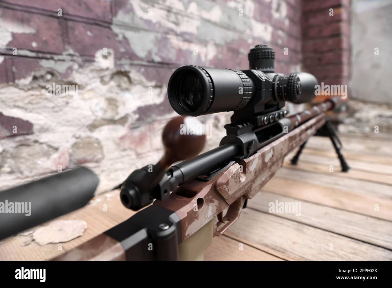 Closeup view of modern powerful sniper rifle with telescopic sight ...