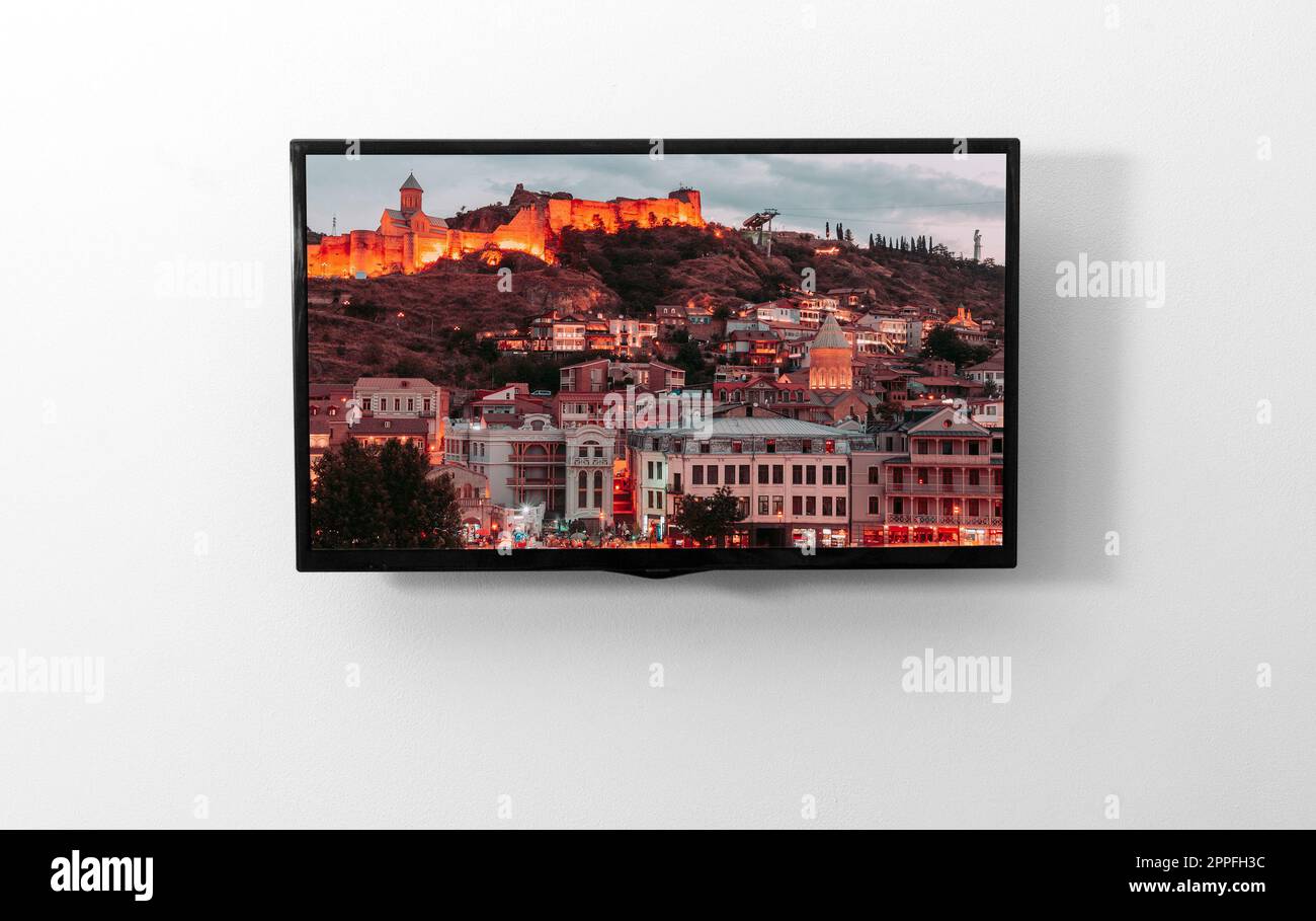 TV monitor on the wall Stock Photo - Alamy