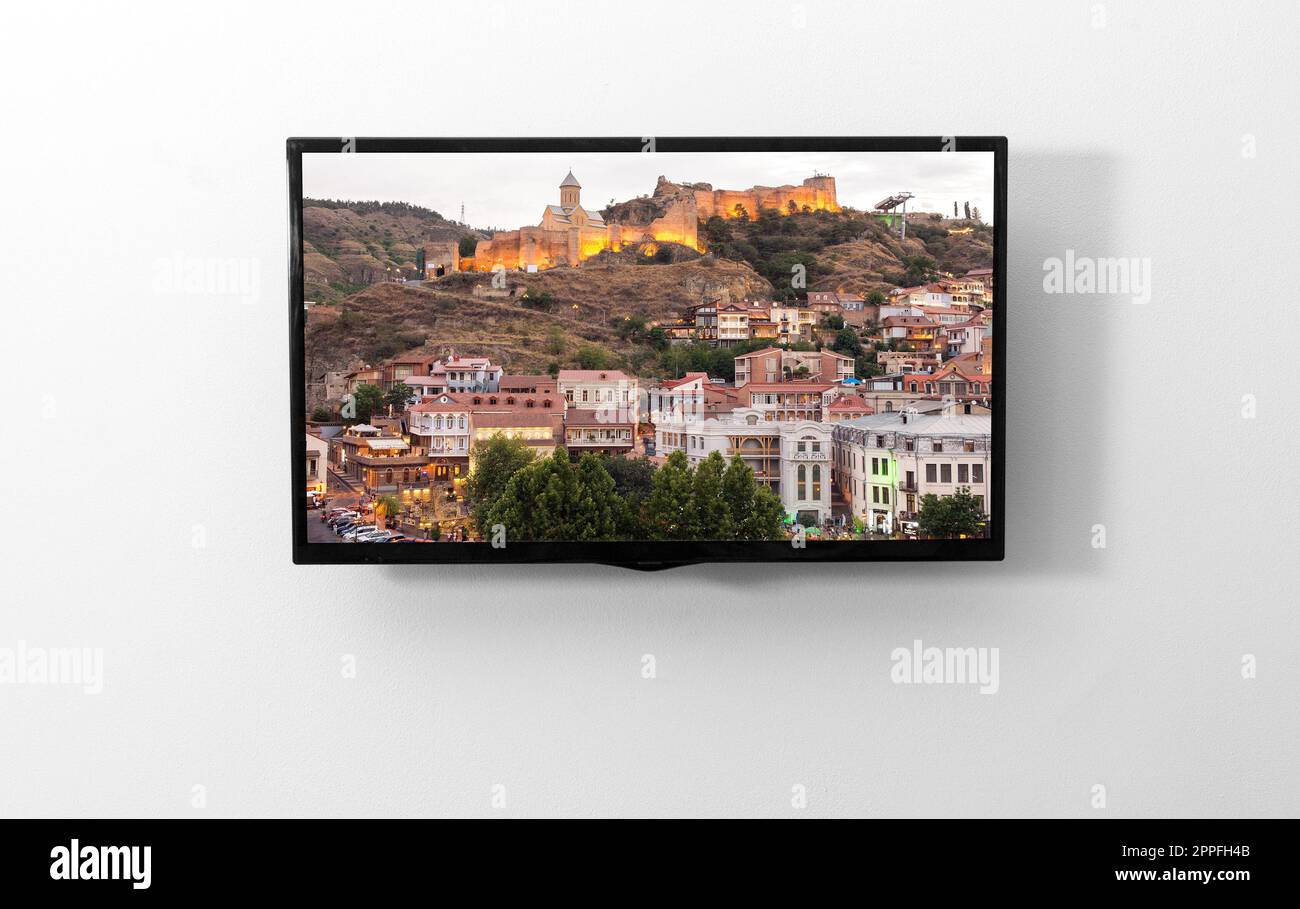 TV monitor on the wall Stock Photo - Alamy