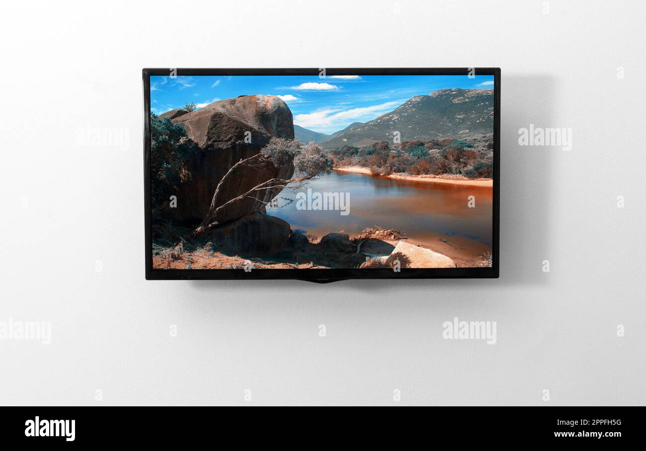 TV monitor on the wall Stock Photo - Alamy