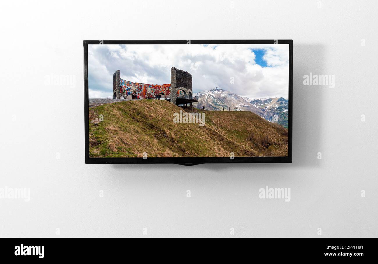 TV monitor on the wall Stock Photo - Alamy