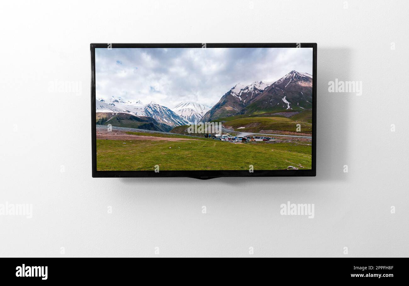 TV monitor on the wall Stock Photo - Alamy