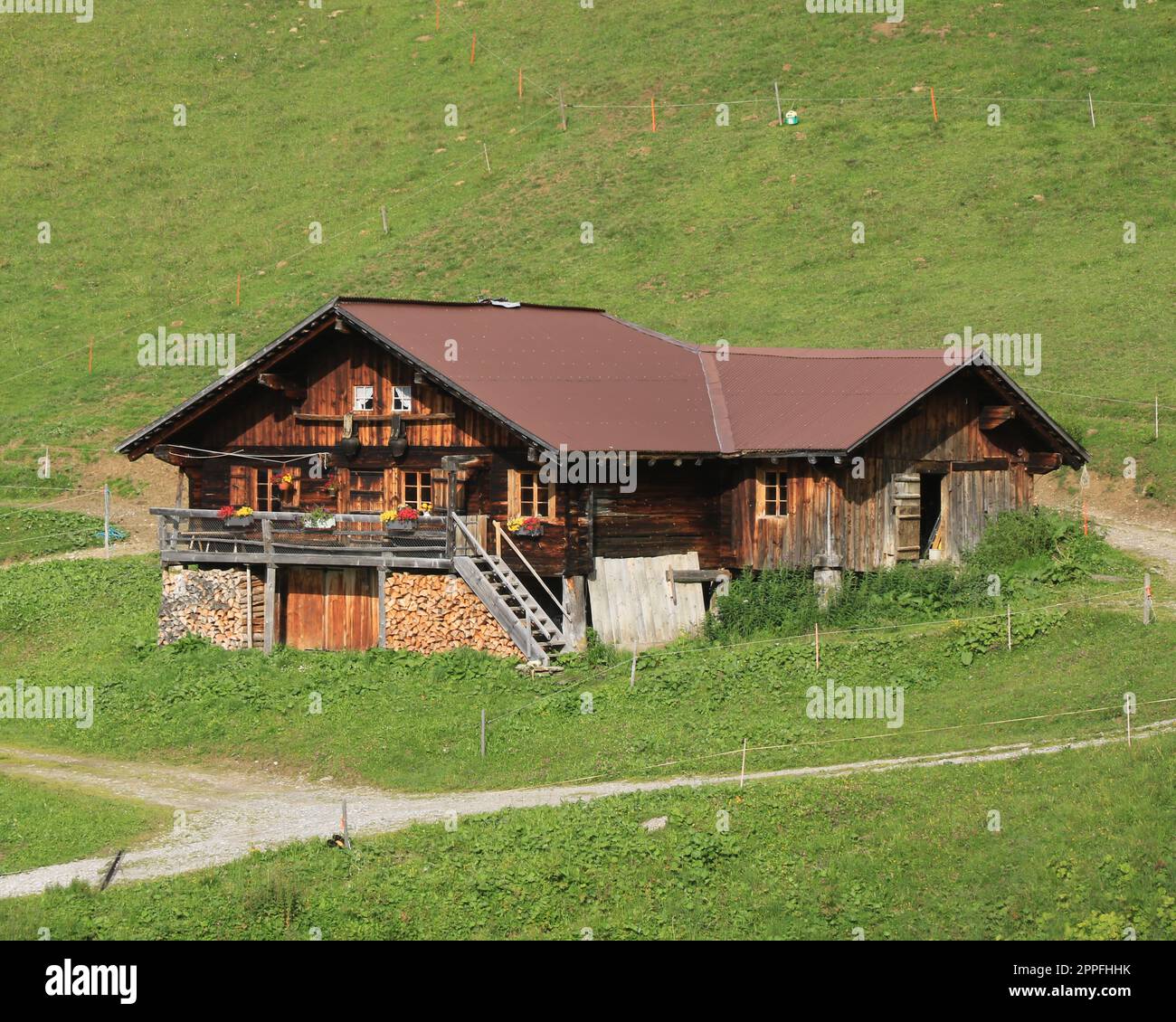 Typical old mountain hut in the Saanenland valley, Switzerland Stock ...