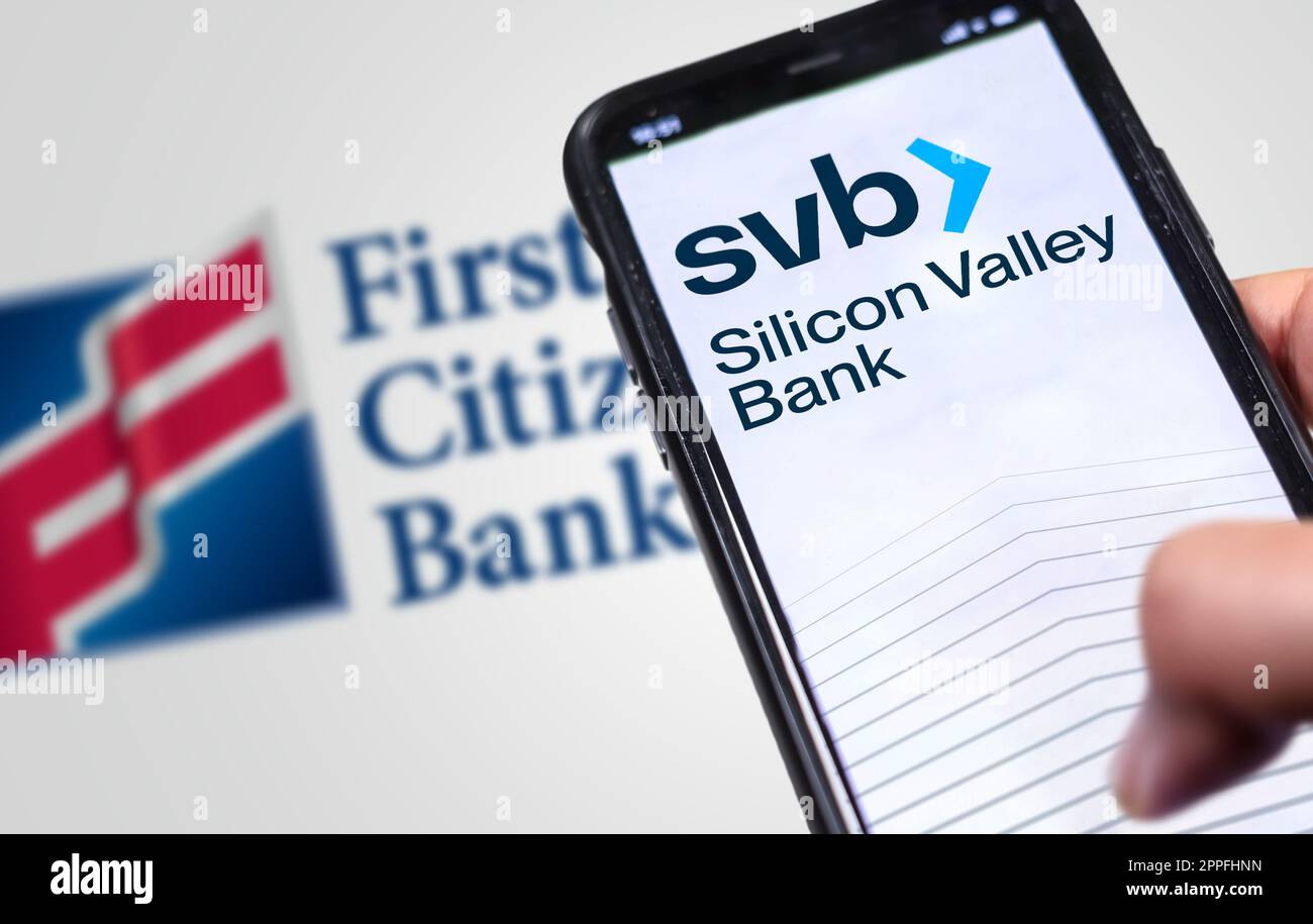 Hand holding a phone with Silicon Valley Bank logo on the screen Stock Photo - Alamy