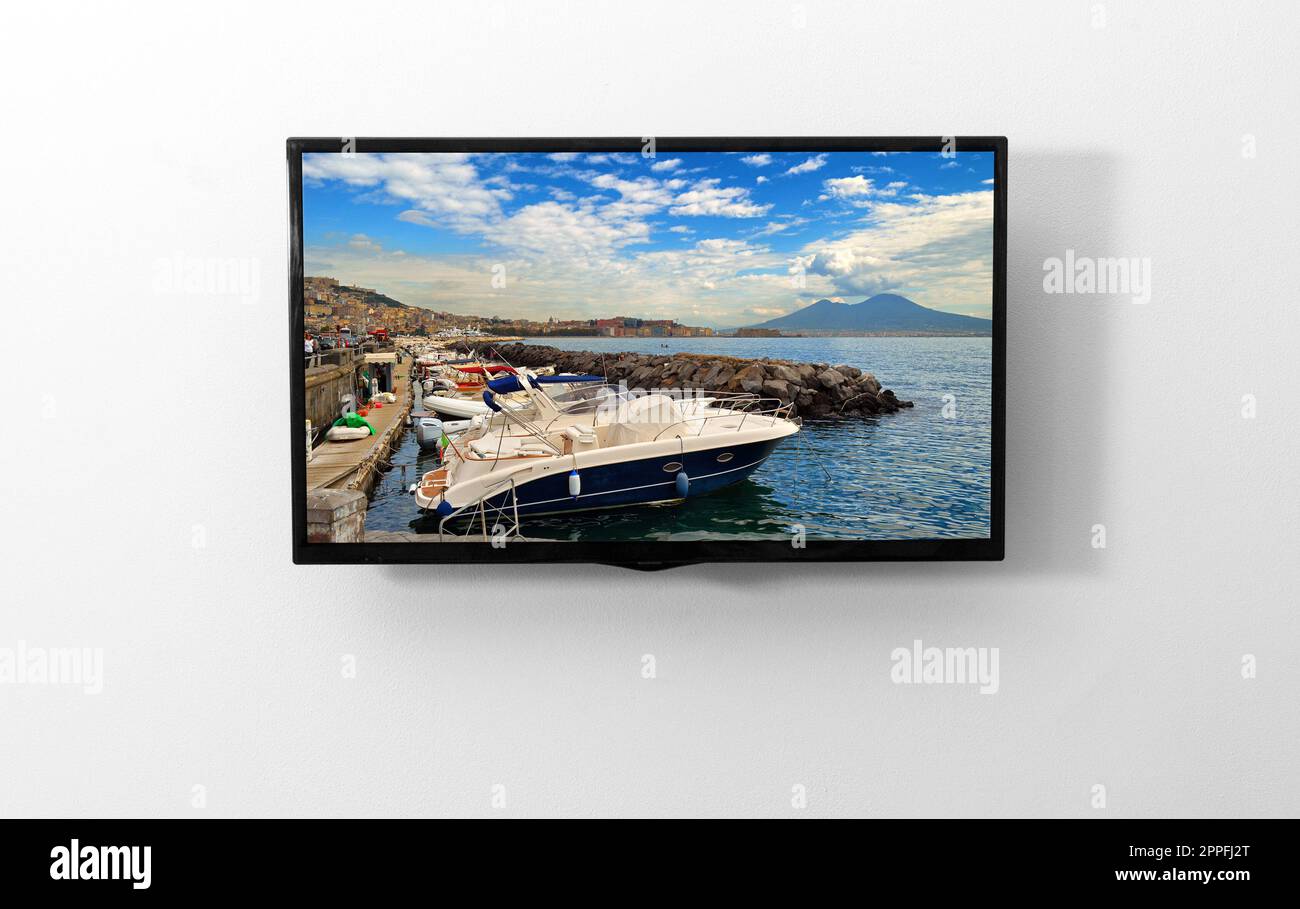 TV monitor on the wall Stock Photo - Alamy