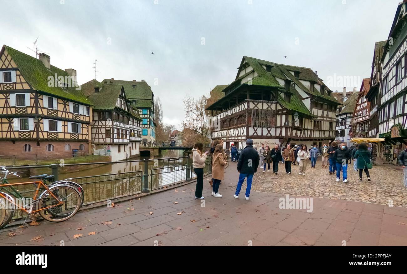 view of medieval buildings reflection on the channel at little france ...