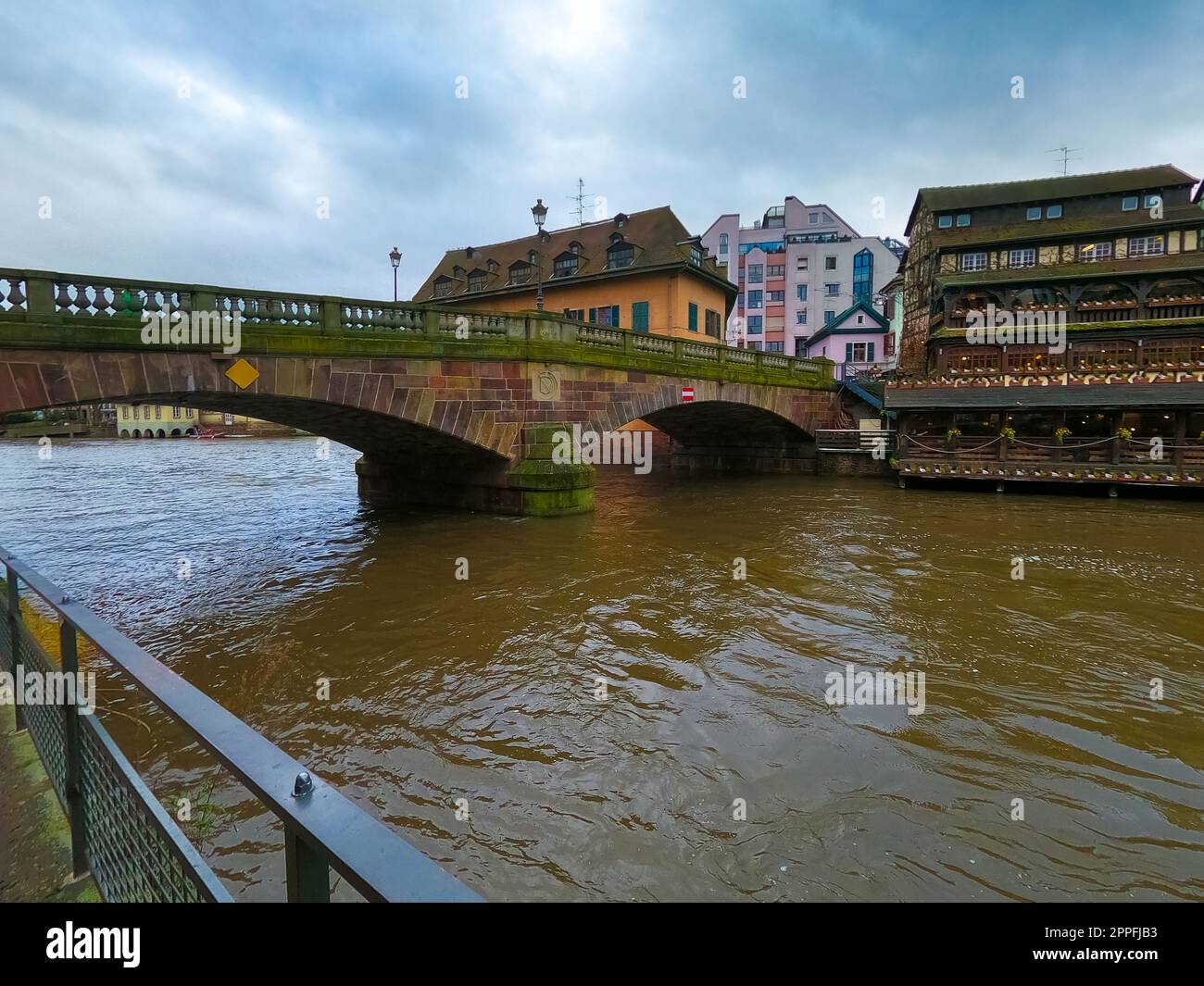 view of medieval buildings reflection on the channel at little france ...