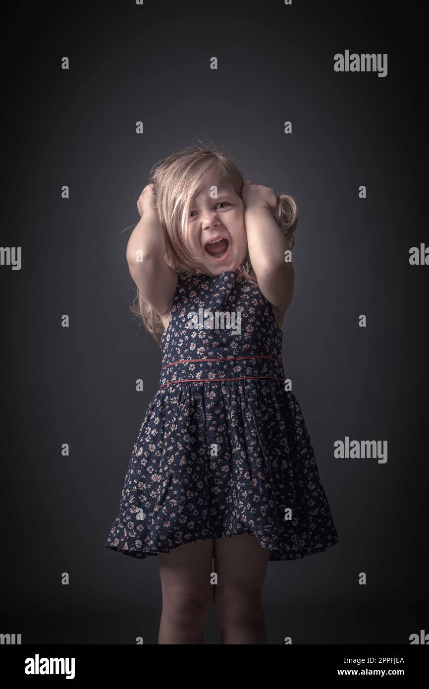 portrait of an angry child Stock Photo - Alamy
