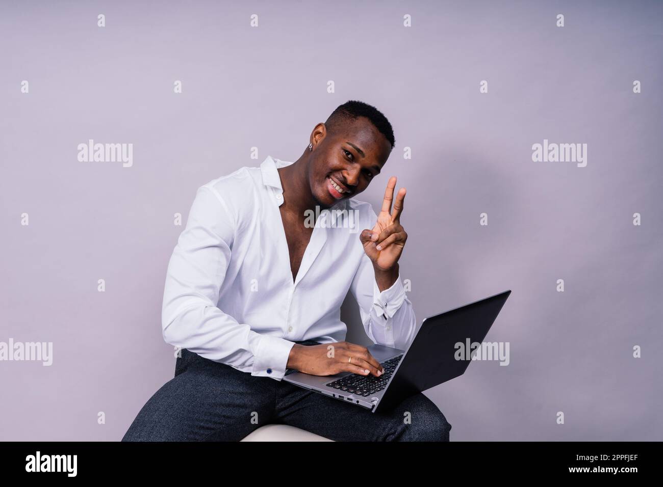 Happy african american young businessman in formal suit. Smiling ...