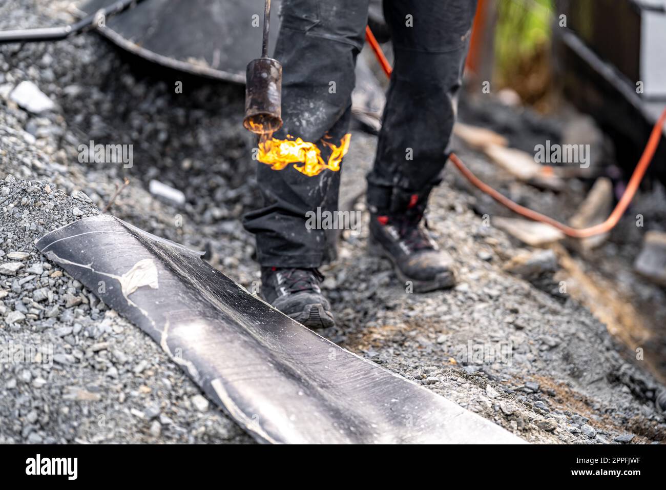 asphalt insulation of buildings. waterproofing, application of help to ...