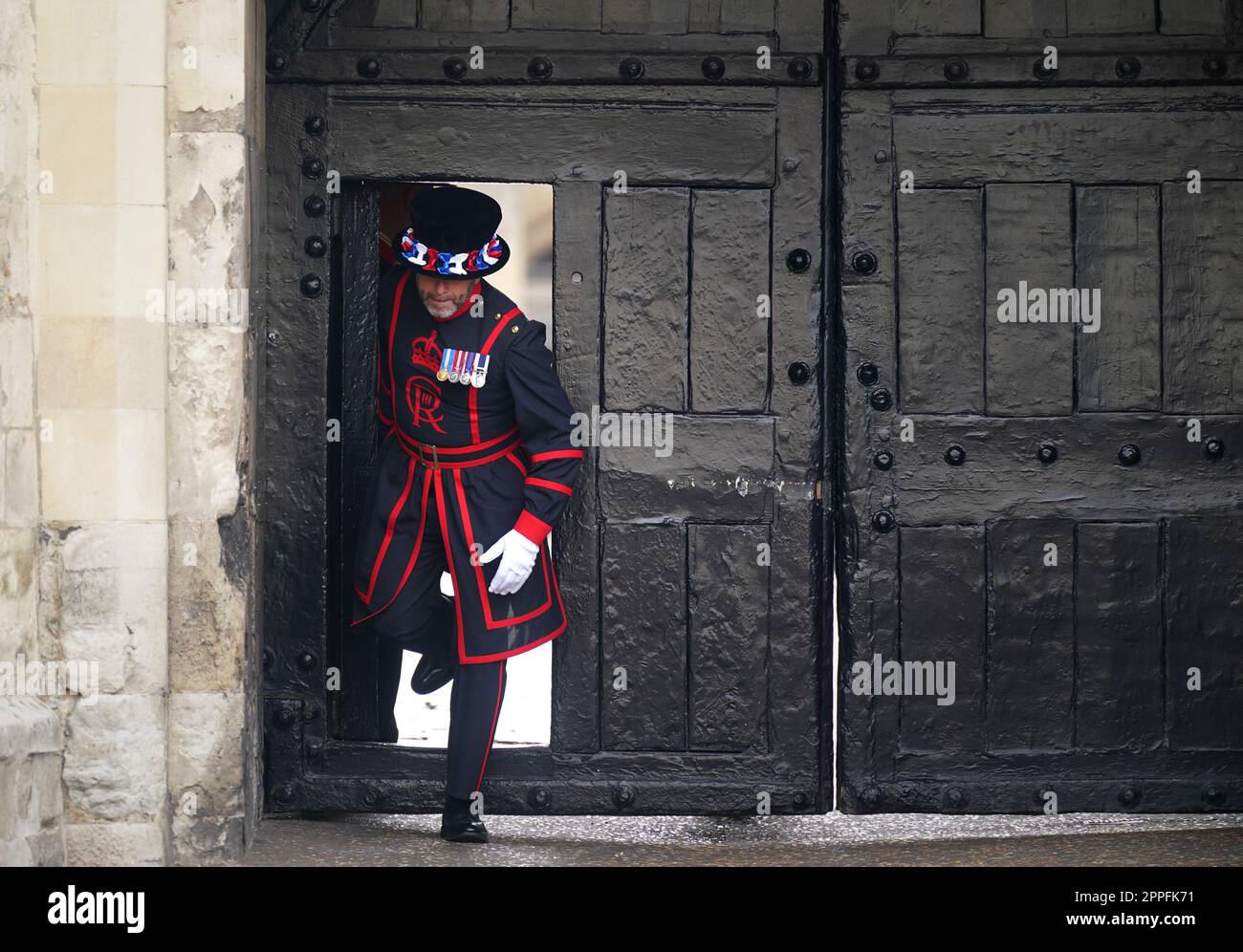 A Yeoman Warder, also known as a Beefeater, in their new uniform for ...