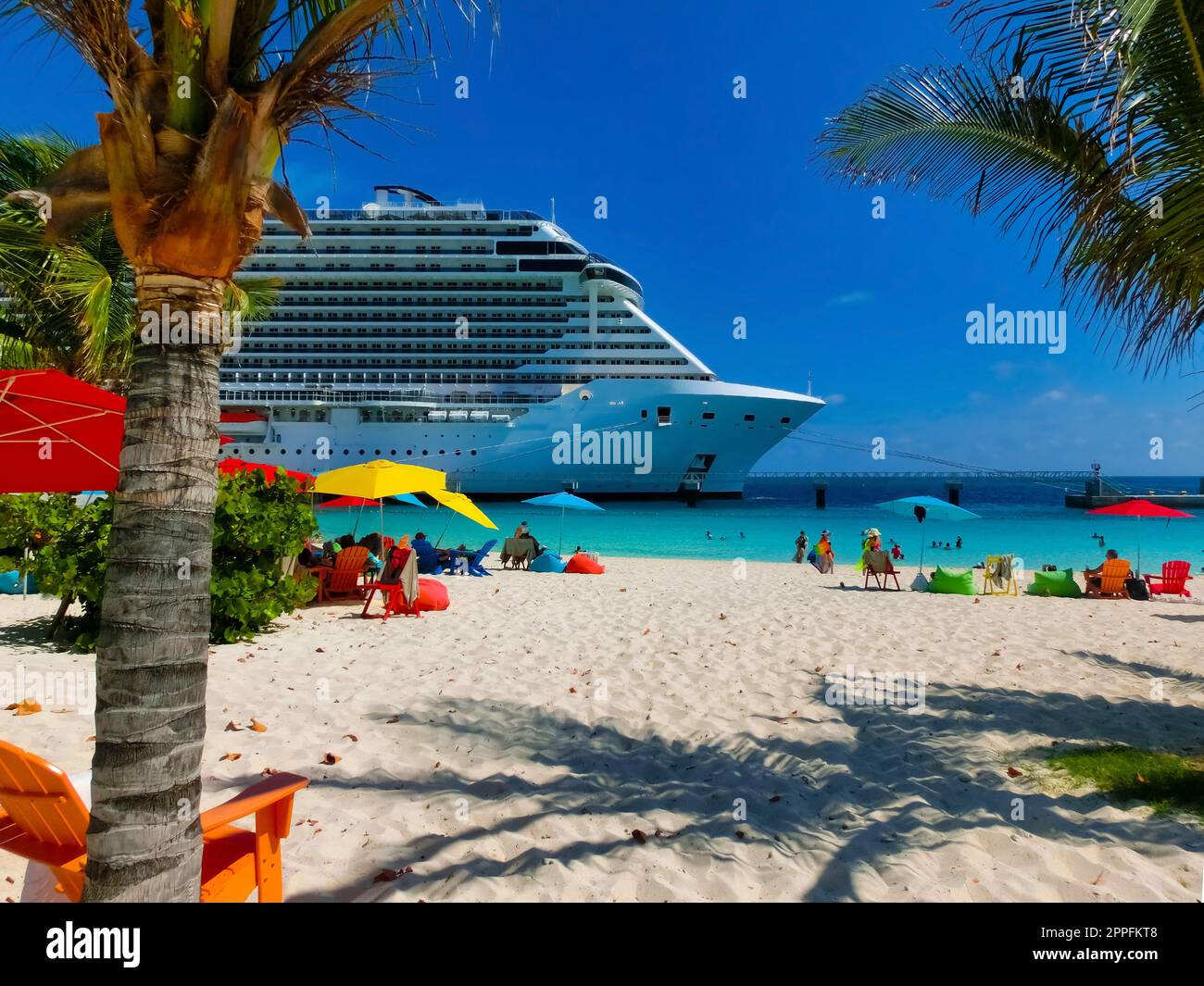 People resting at beach on Ocean Cay island Stock Photo - Alamy