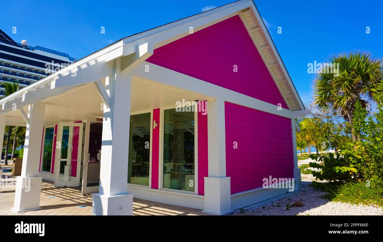 Beach on Ocean Cay Bahamas Island with a colorful houses and turquoise ...