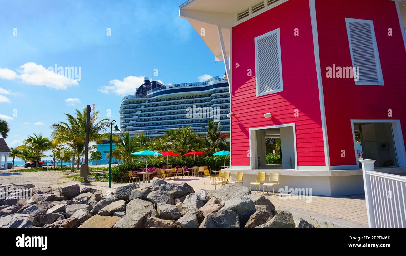 Beach on Ocean Cay Bahamas Island with a colorful houses and turquoise ...