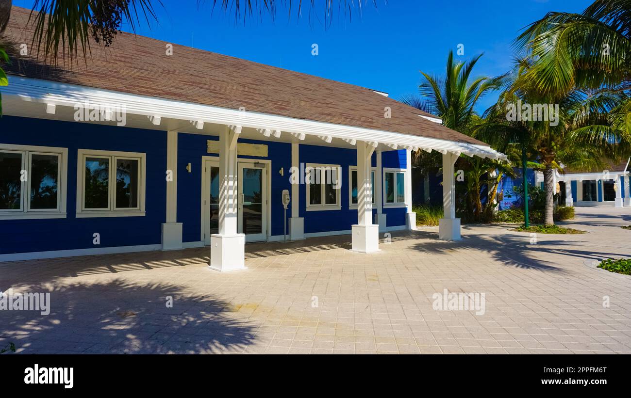 Beach on Ocean Cay Bahamas Island with a colorful houses and turquoise ...