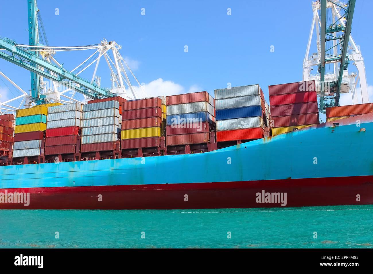 Container ship at Port Miami, one of the largest cargo ports in the US ...