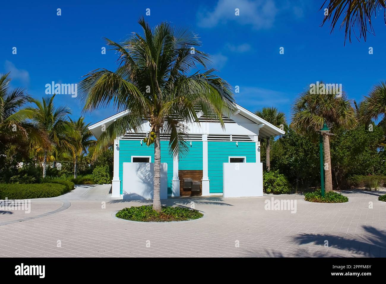 Beach on Ocean Cay Bahamas Island with a colorful houses and turquoise ...