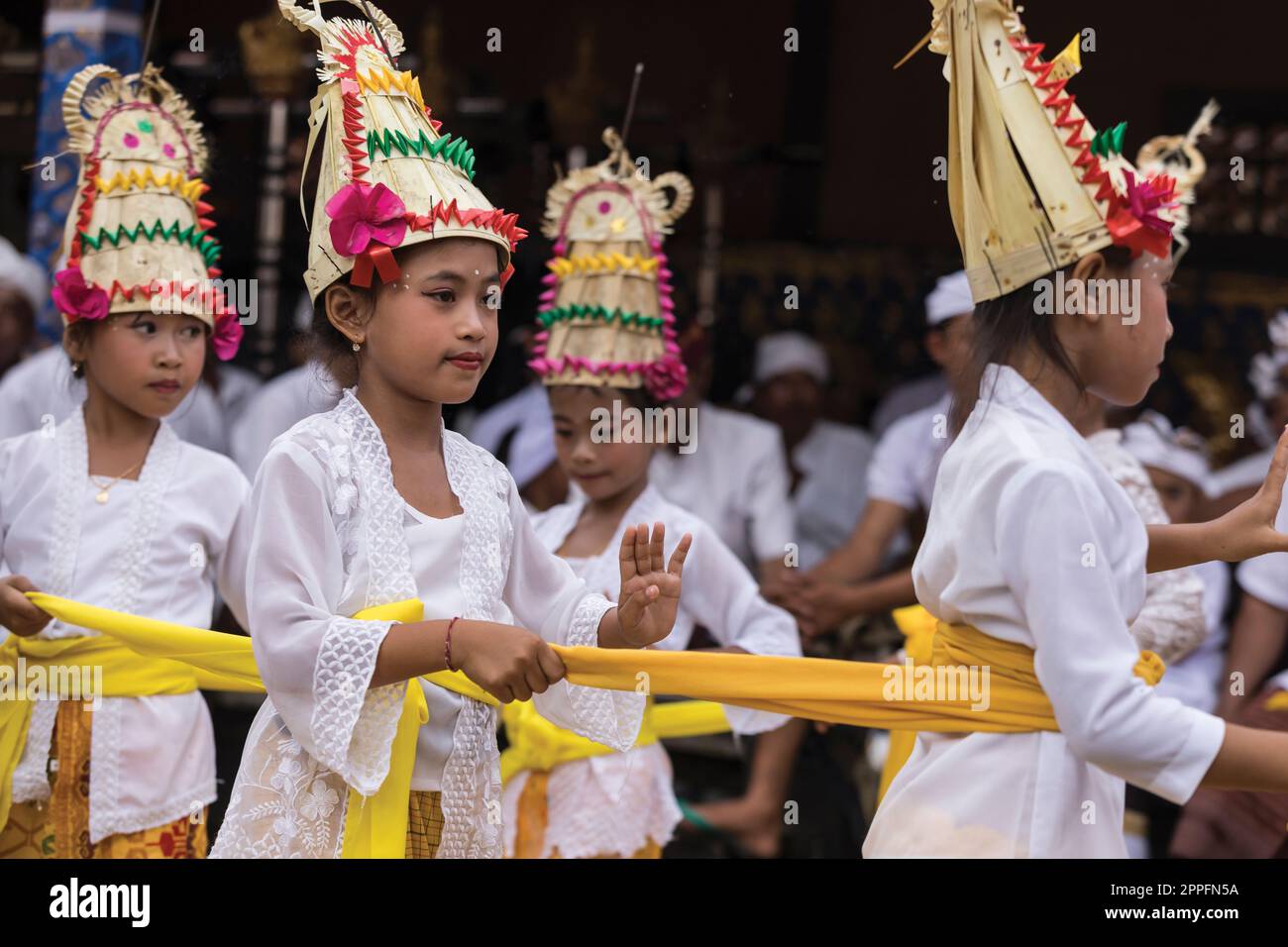 Young Balinese girls dancing during Kuningan ceremony in Bali Stock ...