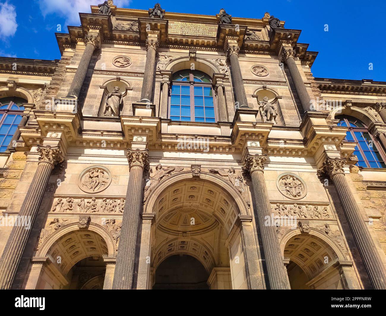 Three stone arches as part of entrance in Zwinger museum complex with ...