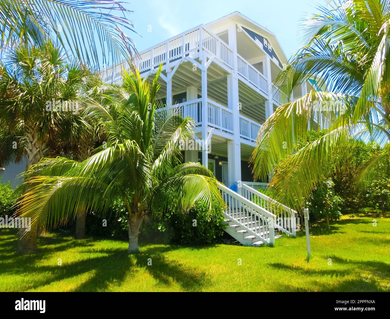 Beach on Ocean Cay Bahamas Island with a colorful houses and turquoise ...