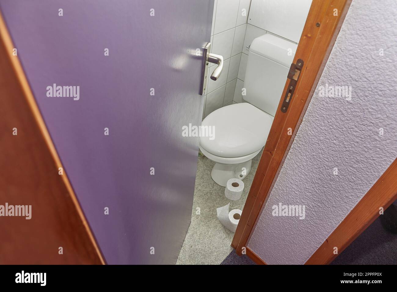 Toilet door opening Stock Photo - Alamy