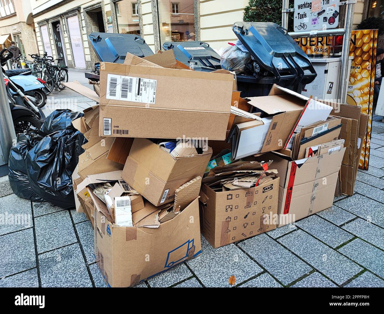 Cardboard boxes and rubbish bins are available for collection Stock ...