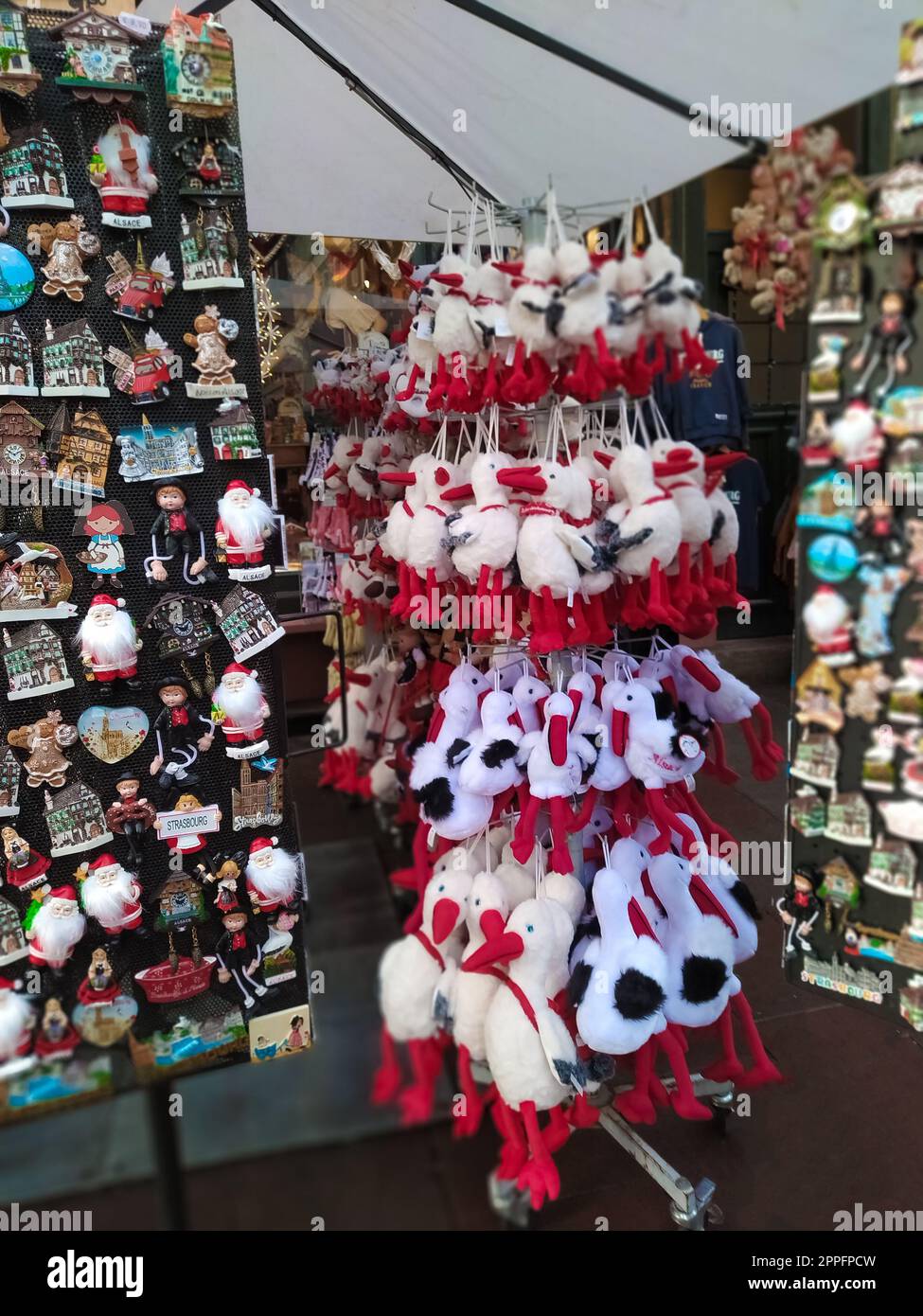 Souvenir shop along the street of Cathedral Notre Dame of Strasbourg ...