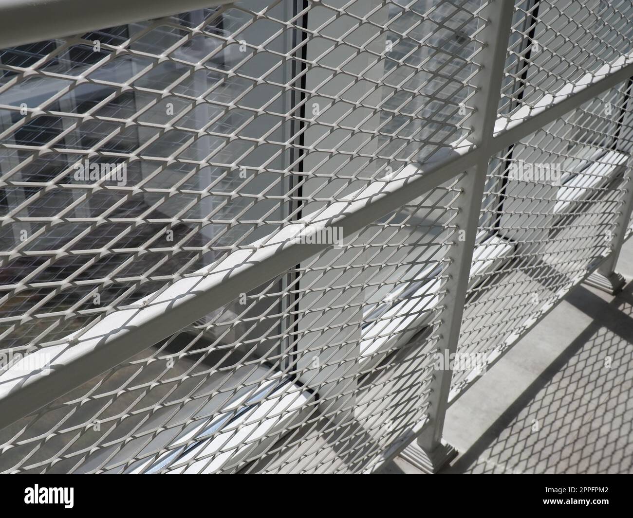 New white frames and windows. Metal fence for the safety of ...