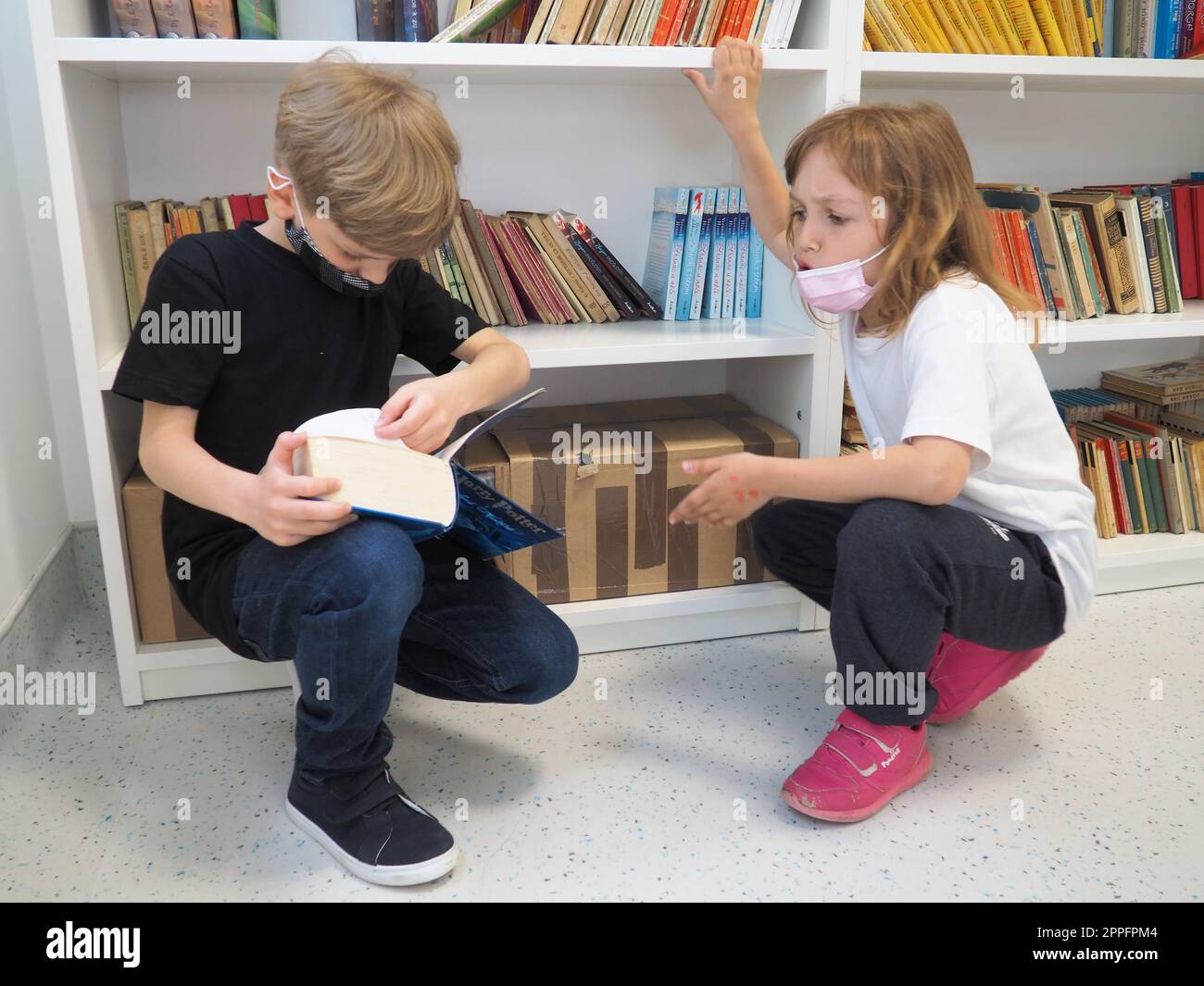 Sremska Mitrovica, Serbia, May 15, 2021 Children in the school library ...