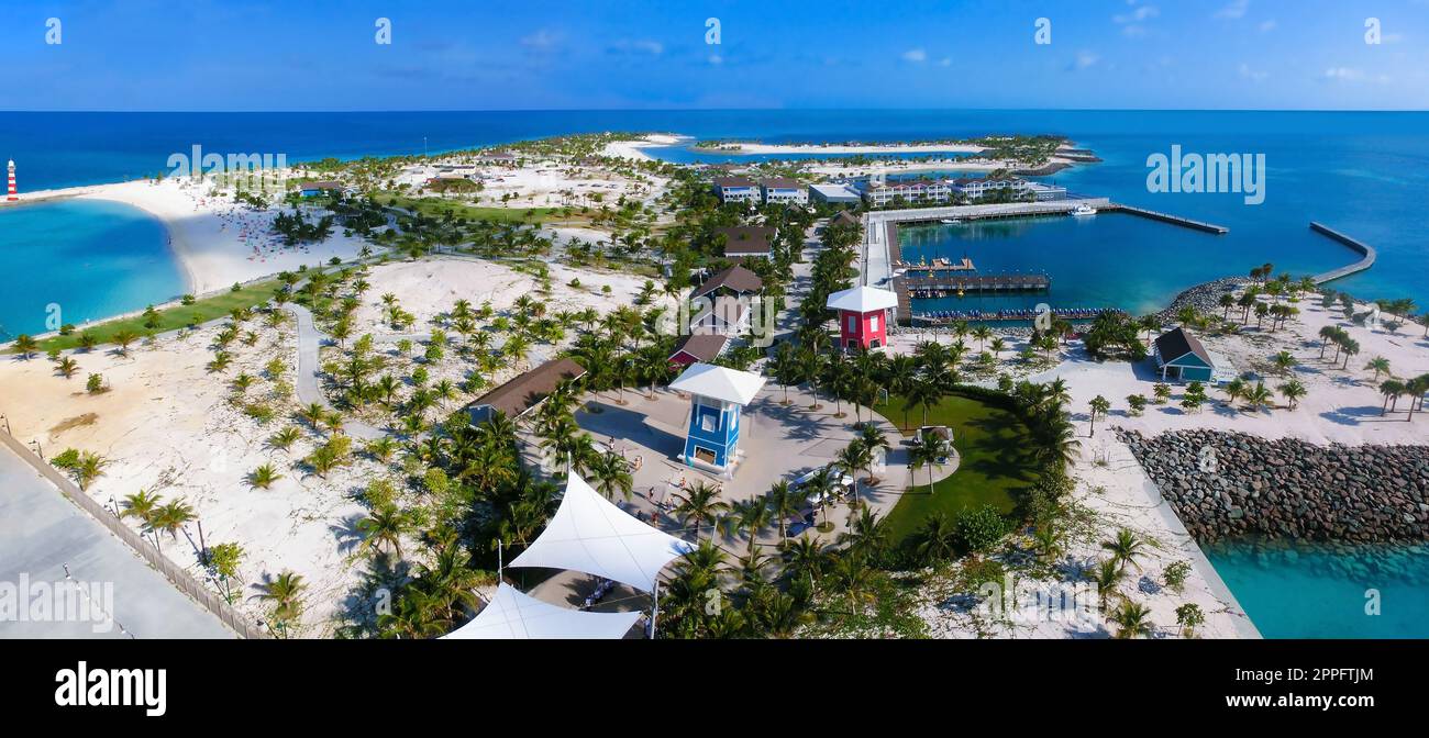 Beach on Ocean Cay Bahamas Island with a colorful houses and turquoise ...