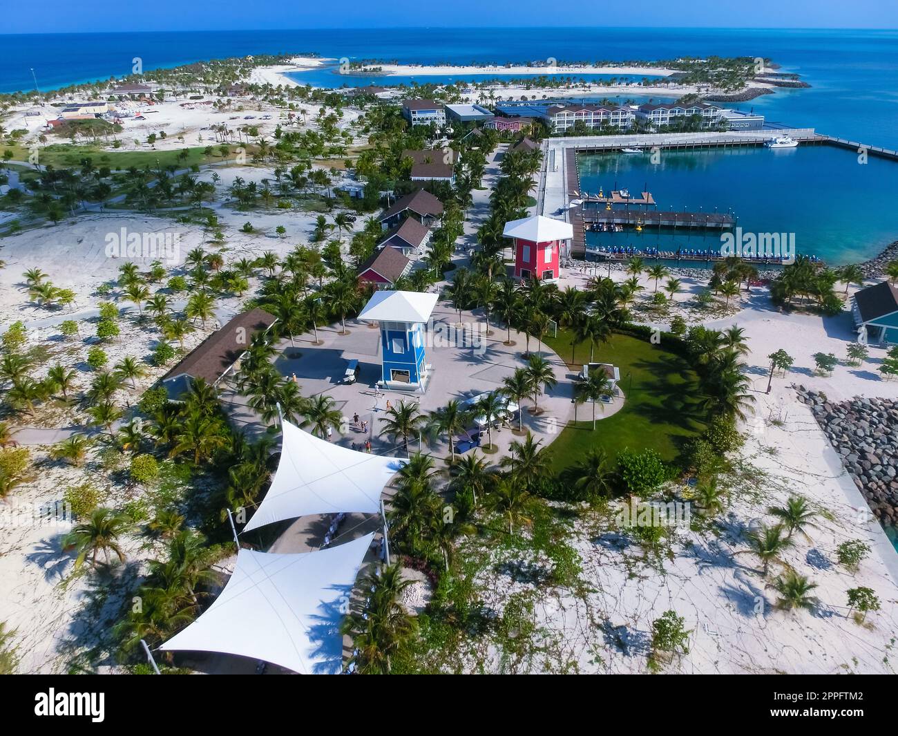 Beach on Ocean Cay Bahamas Island with a colorful houses and turquoise ...