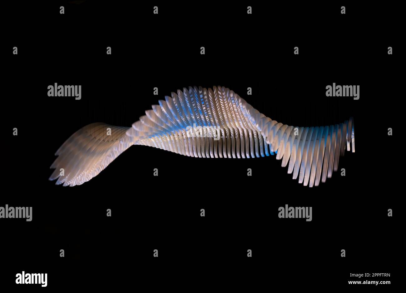 Illuminated moving object in the exhibition space in natural and ...