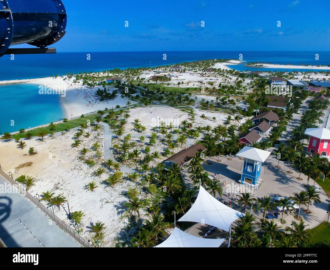 Beach on Ocean Cay Bahamas Island with a colorful houses and turquoise ...