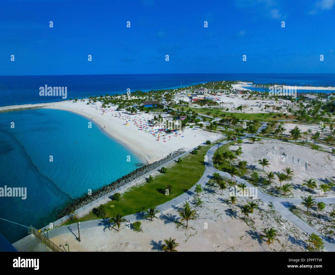 Beach on Ocean Cay Bahamas Island with a colorful houses and turquoise ...