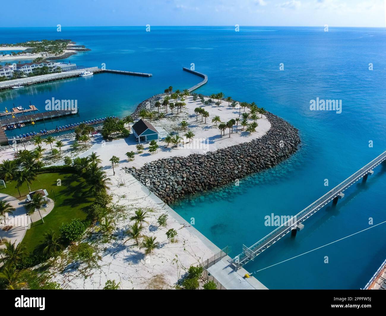 Beach on Ocean Cay Bahamas Island with a colorful houses and turquoise ...